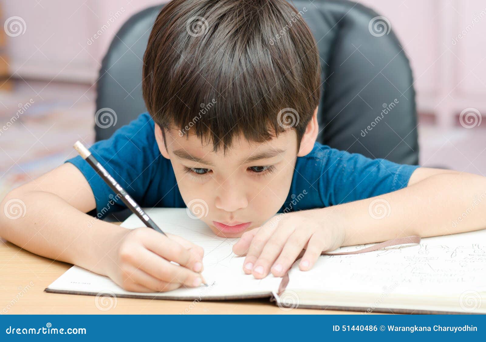 Little Boy Writing and Thinking Homework Stock Photo - Image of male ...
