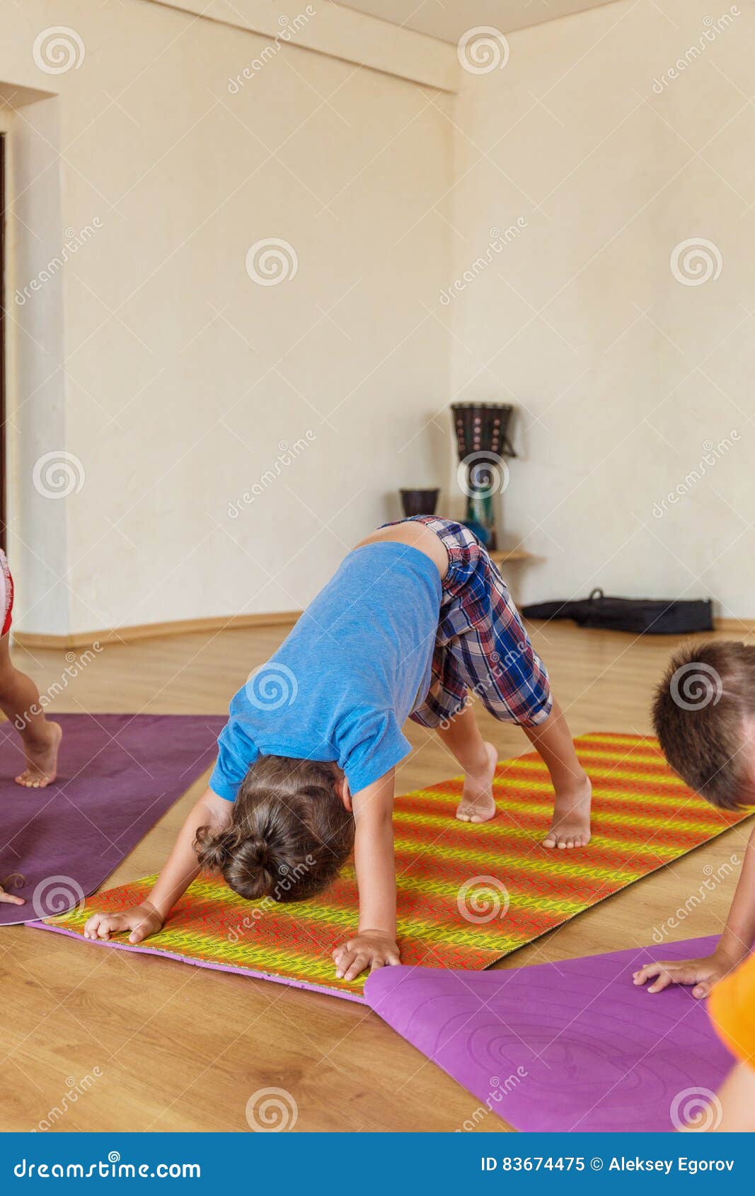 Little boy on a yoga class stock image. Image of little - 83674475