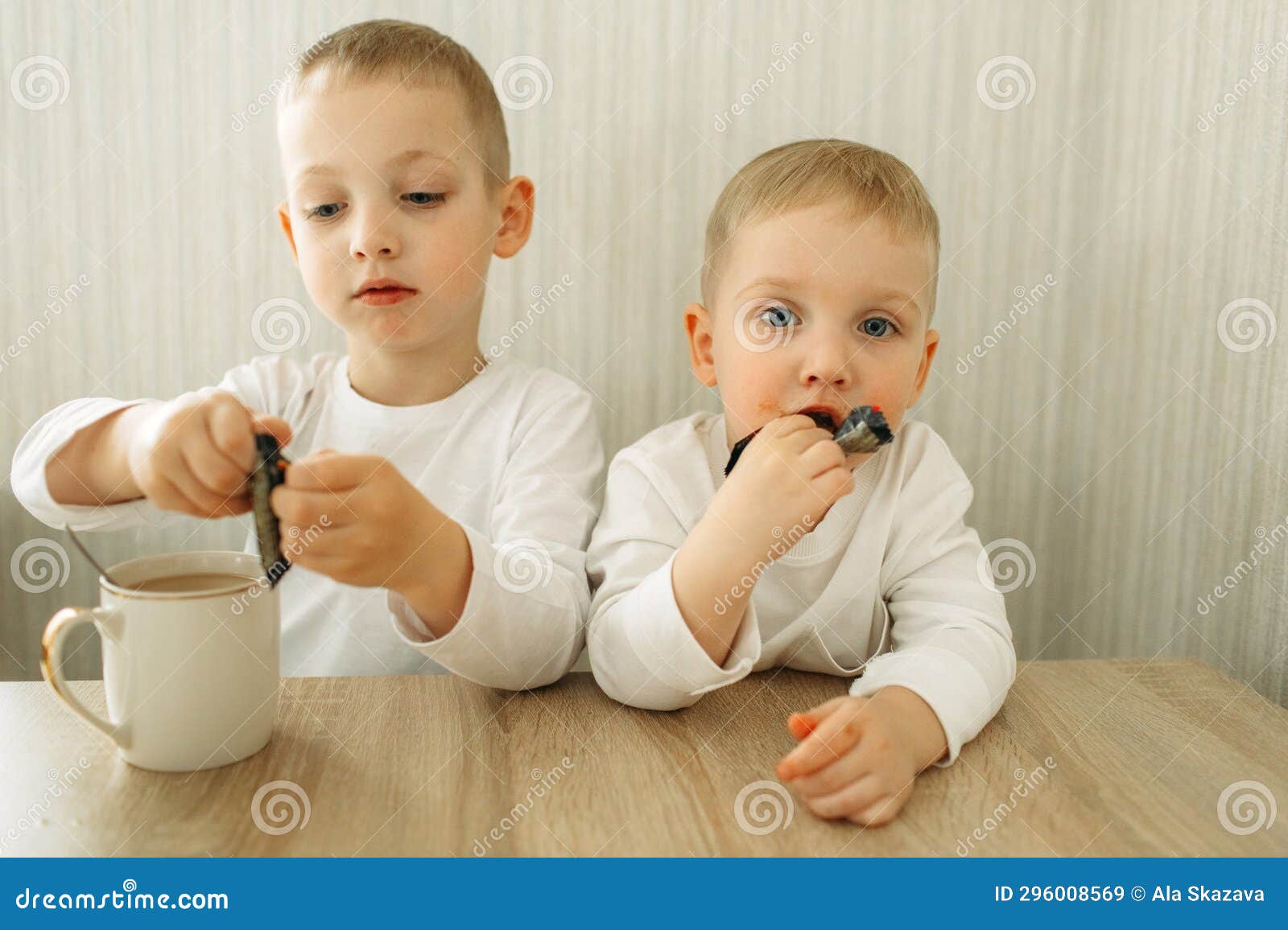 Little Boys Drinking Tea at Home Stock Image - Image of small, support ...