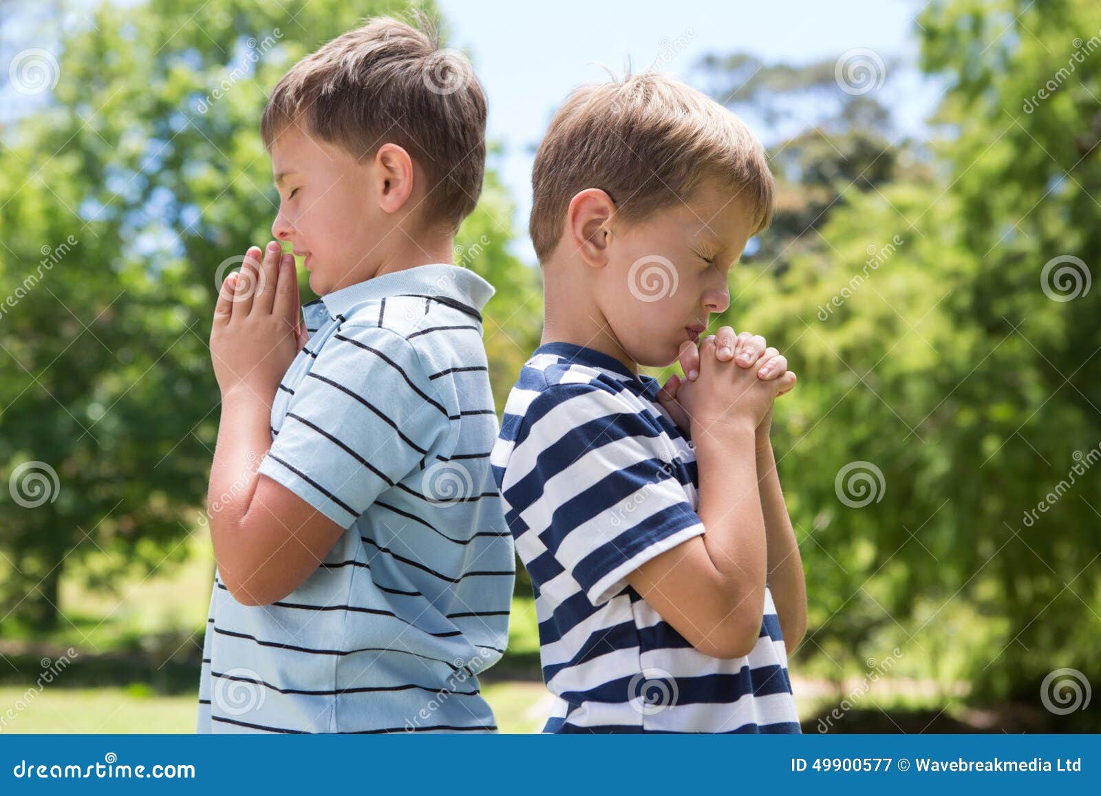 Little Boys Praying in the Park Stock Image - Image of closed, brethren ...