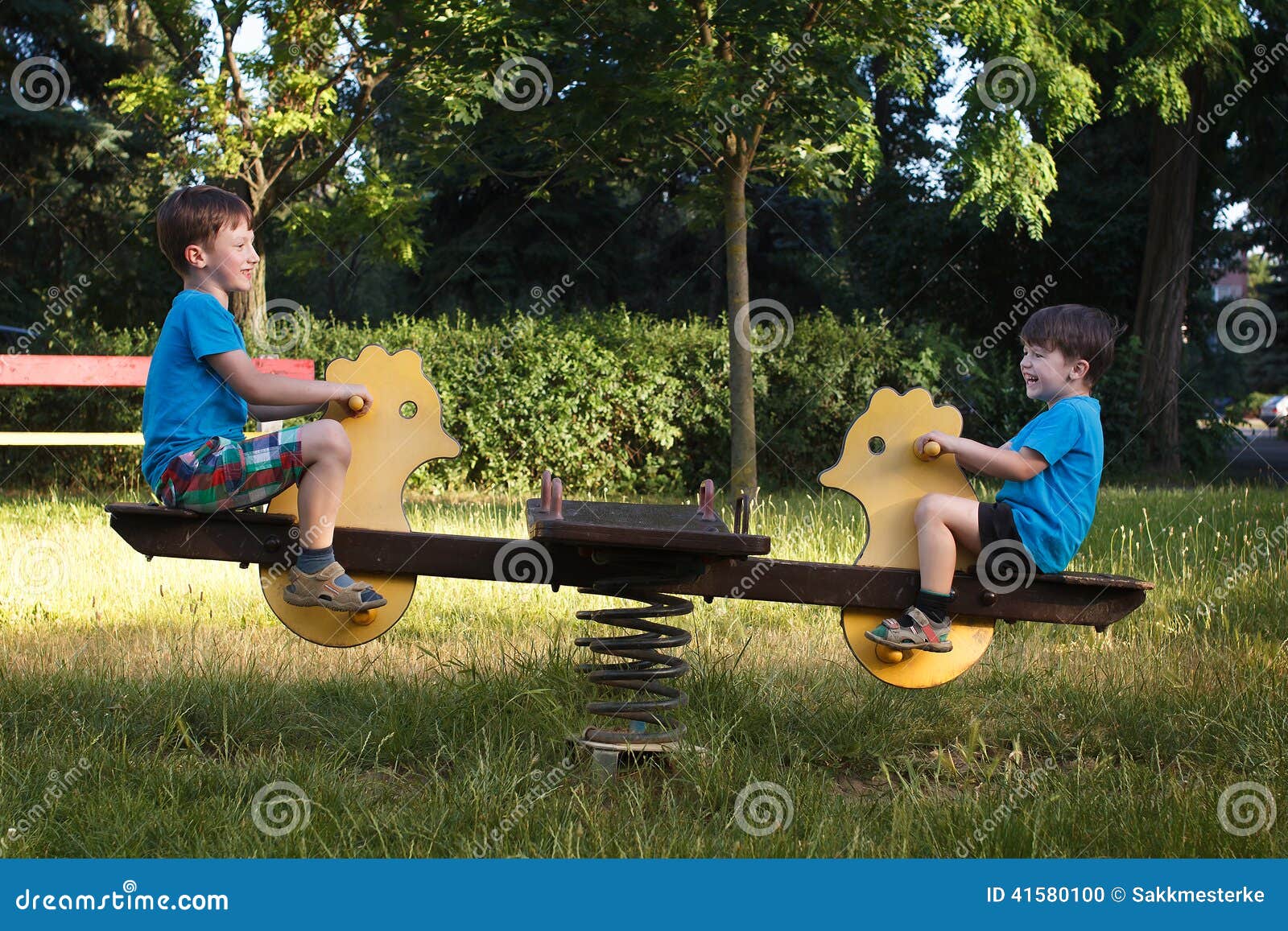 Little boys on seesaw stock photo. Image of preschooler - 41580100