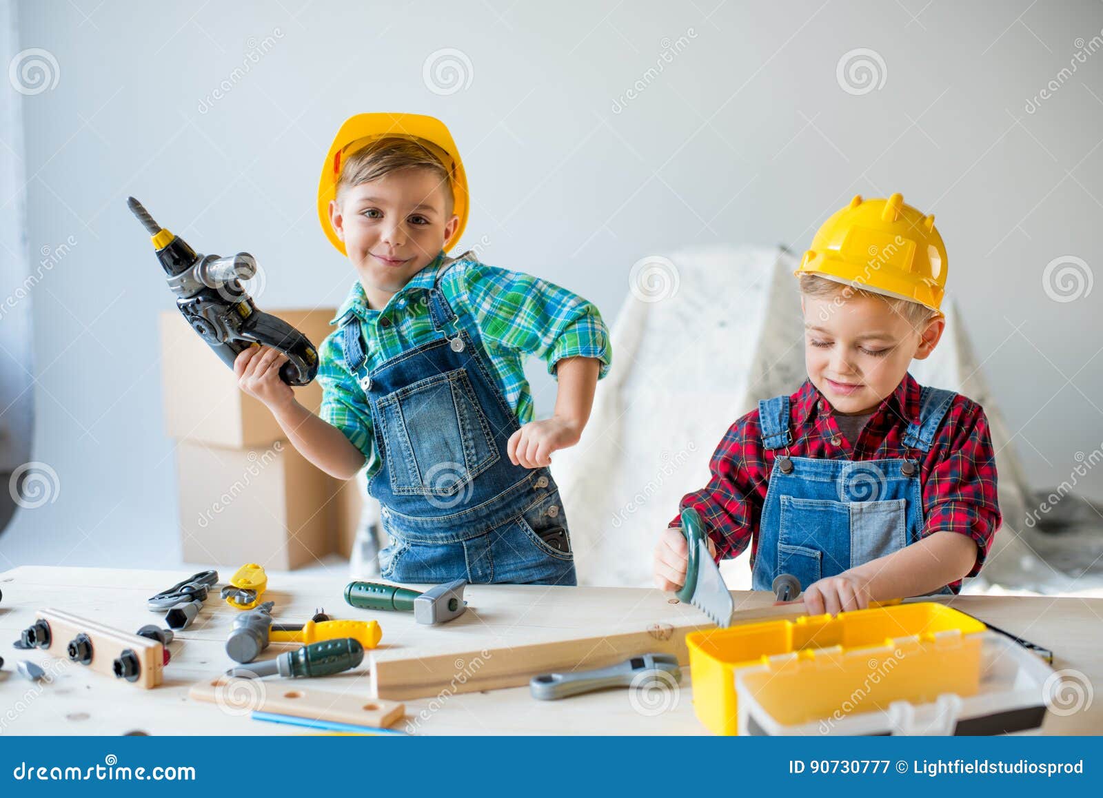 Little boys with tools stock image. Image of contractors - 90730777