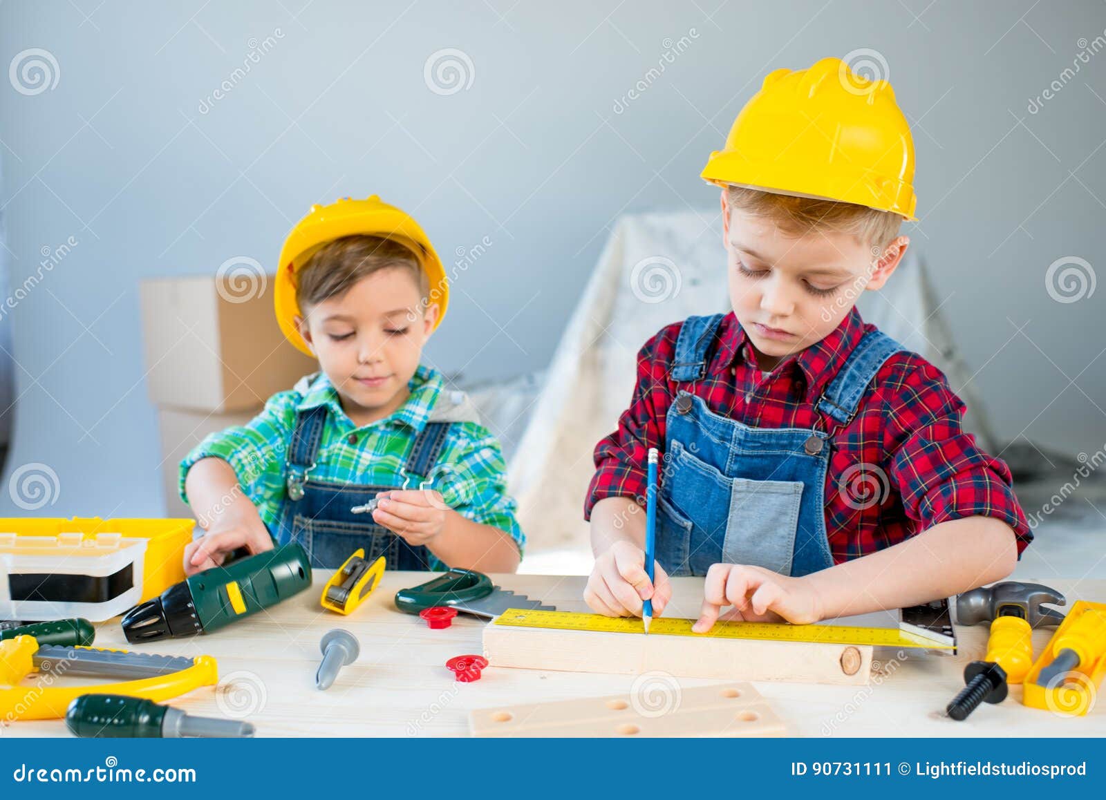 Little boys with tools stock image. Image of hardhats - 90731111