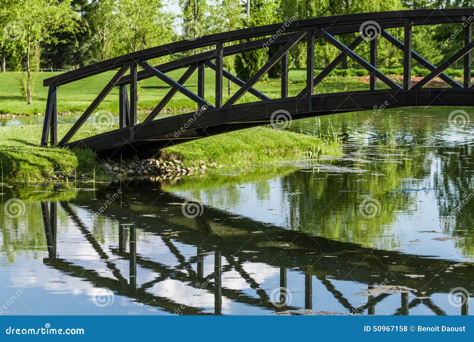 Little Bridge Over a Pond stock photo. Image of peaceful - 50967158