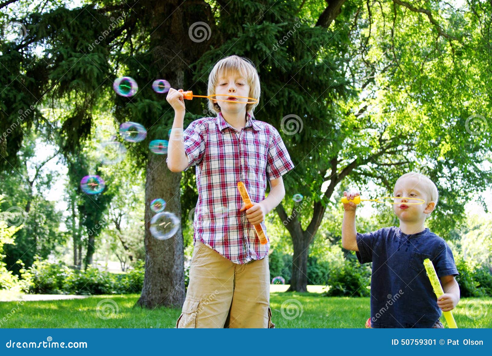 Little Brother Copying Big Brother Stock Image - Image of play ...