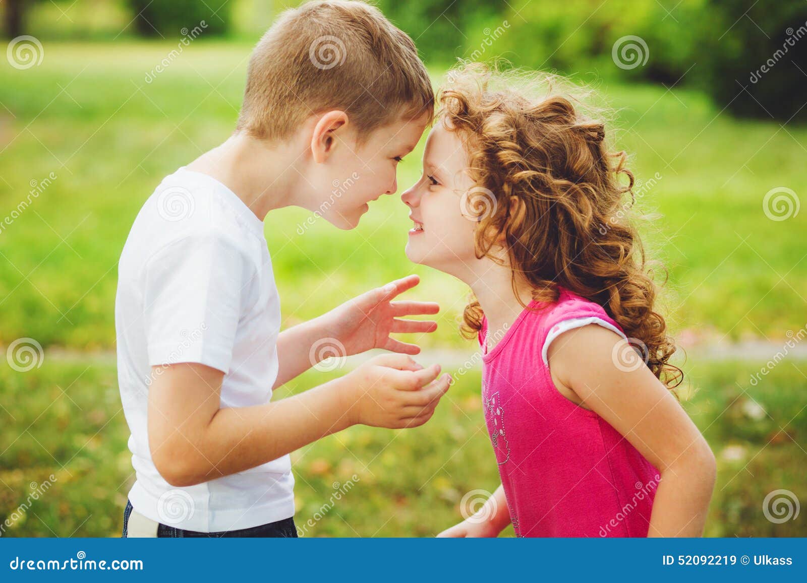 Little Brother and Sister Confronted Foreheads. Stock Image - Image of ...