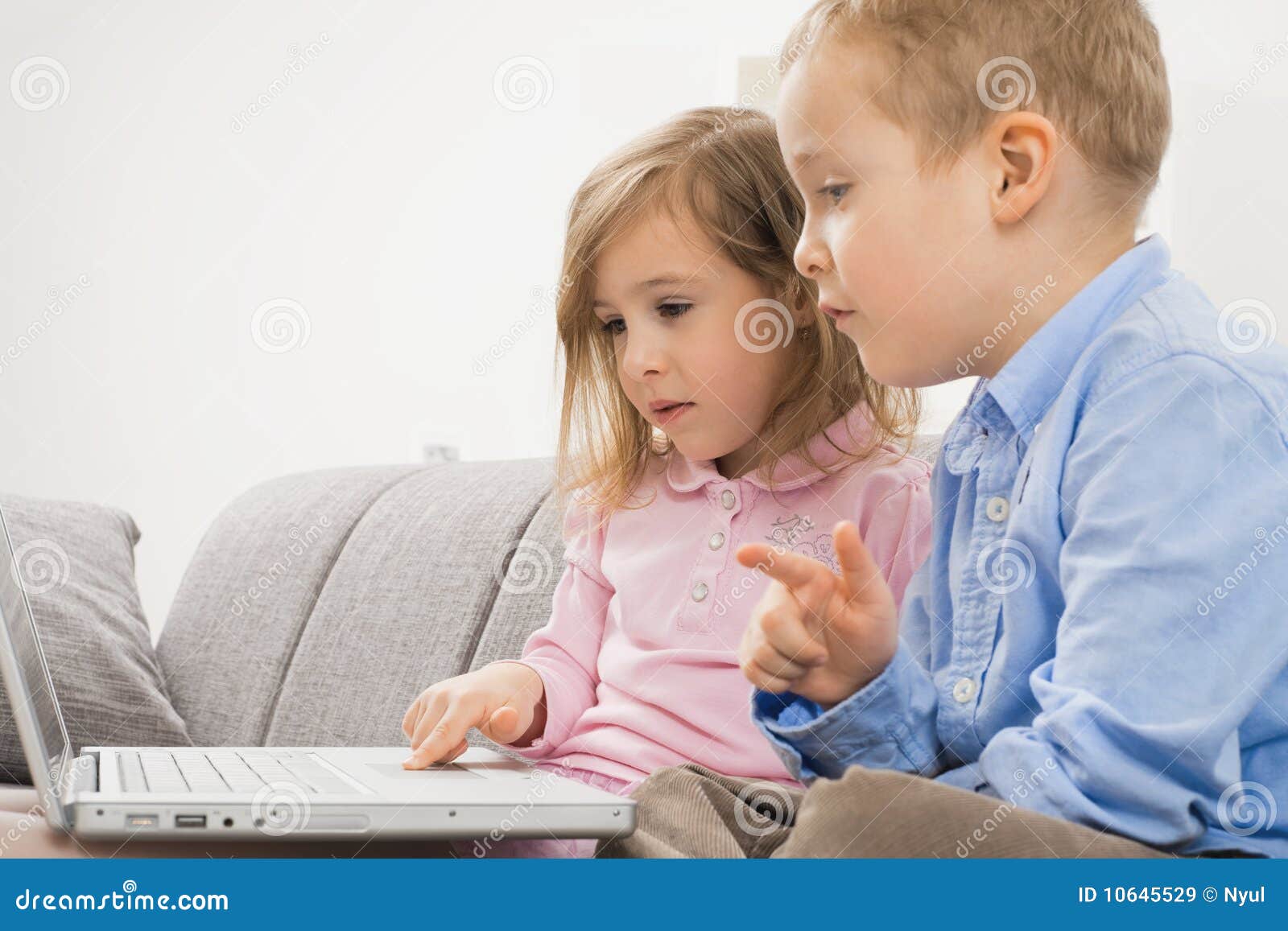 Little Brother and Sister with Laptop Stock Image - Image of interior ...