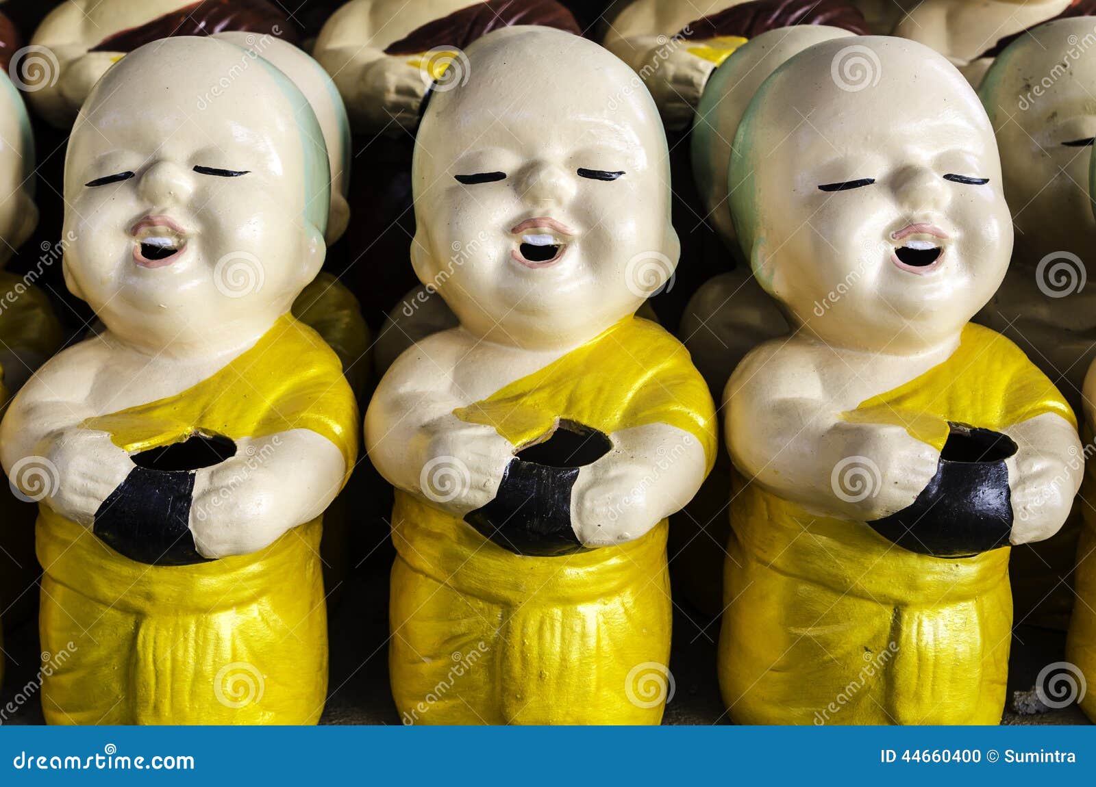 Little buddhist monk dolls stock photo. Image of religious - 44660400