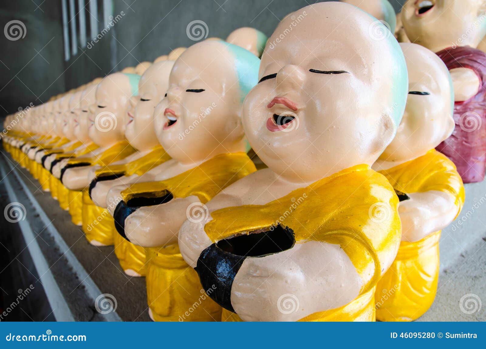 Little buddhist monk dolls stock photo. Image of religion - 46095280