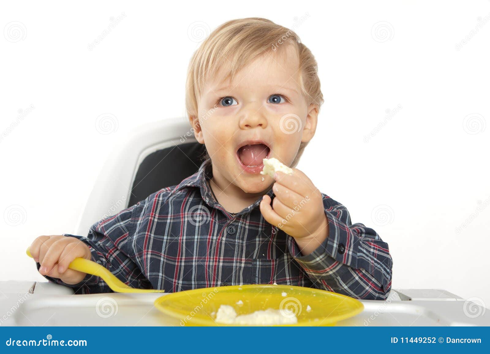 Little Caucasian Boy Eat at Baby Table Stock Photo - Image of sweet ...