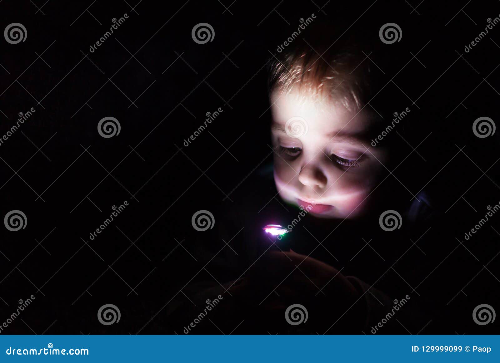 Boy Playing with Small Flashlight Stock Image - Image of camouflage ...