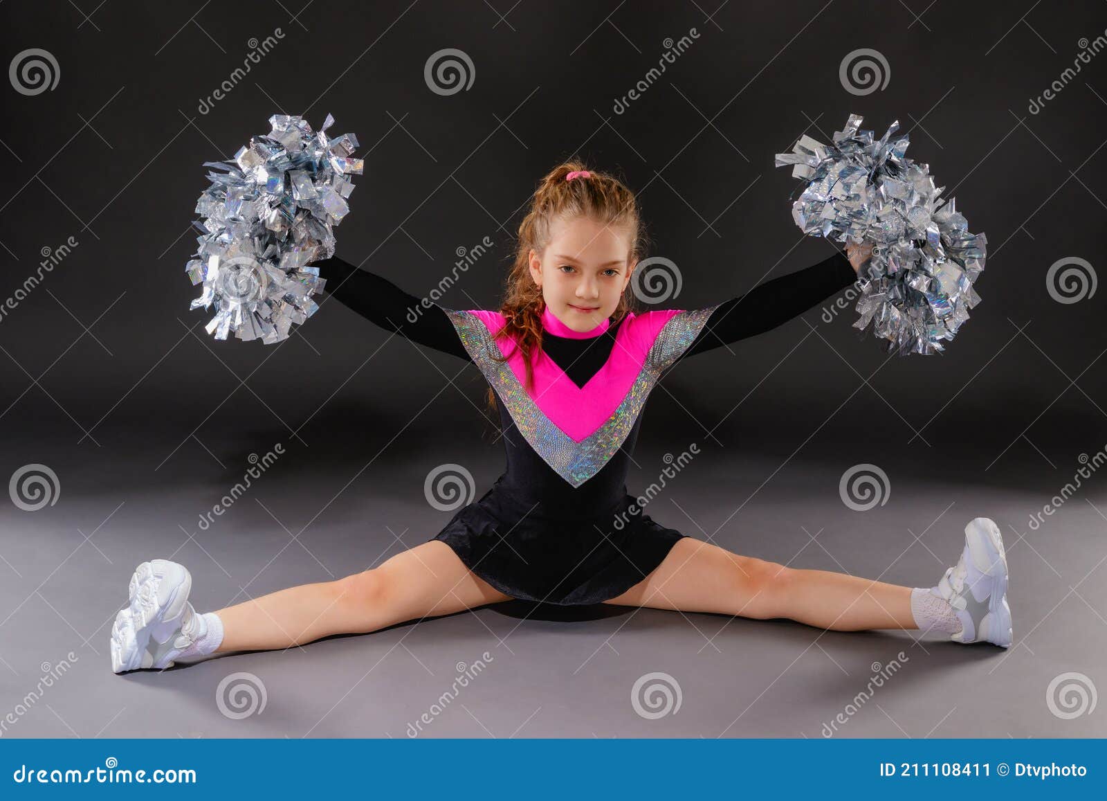 A Little Cheerleader Girl Does the Splits Stock Image - Image of jump ...