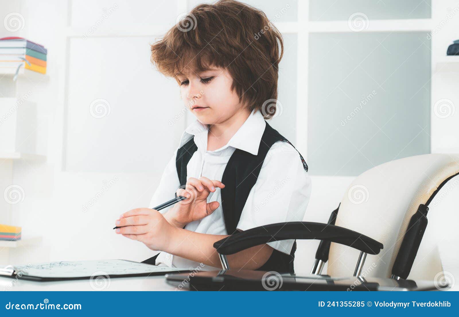 Little Child Boy Businessman or Manager Working in Office. Stock Image ...