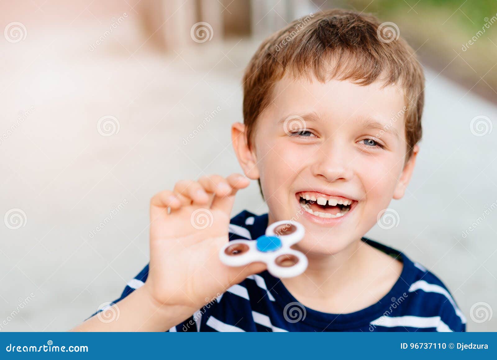 Little Child Boy Playing with Fidget Spinner Outdoors Stock Photo ...