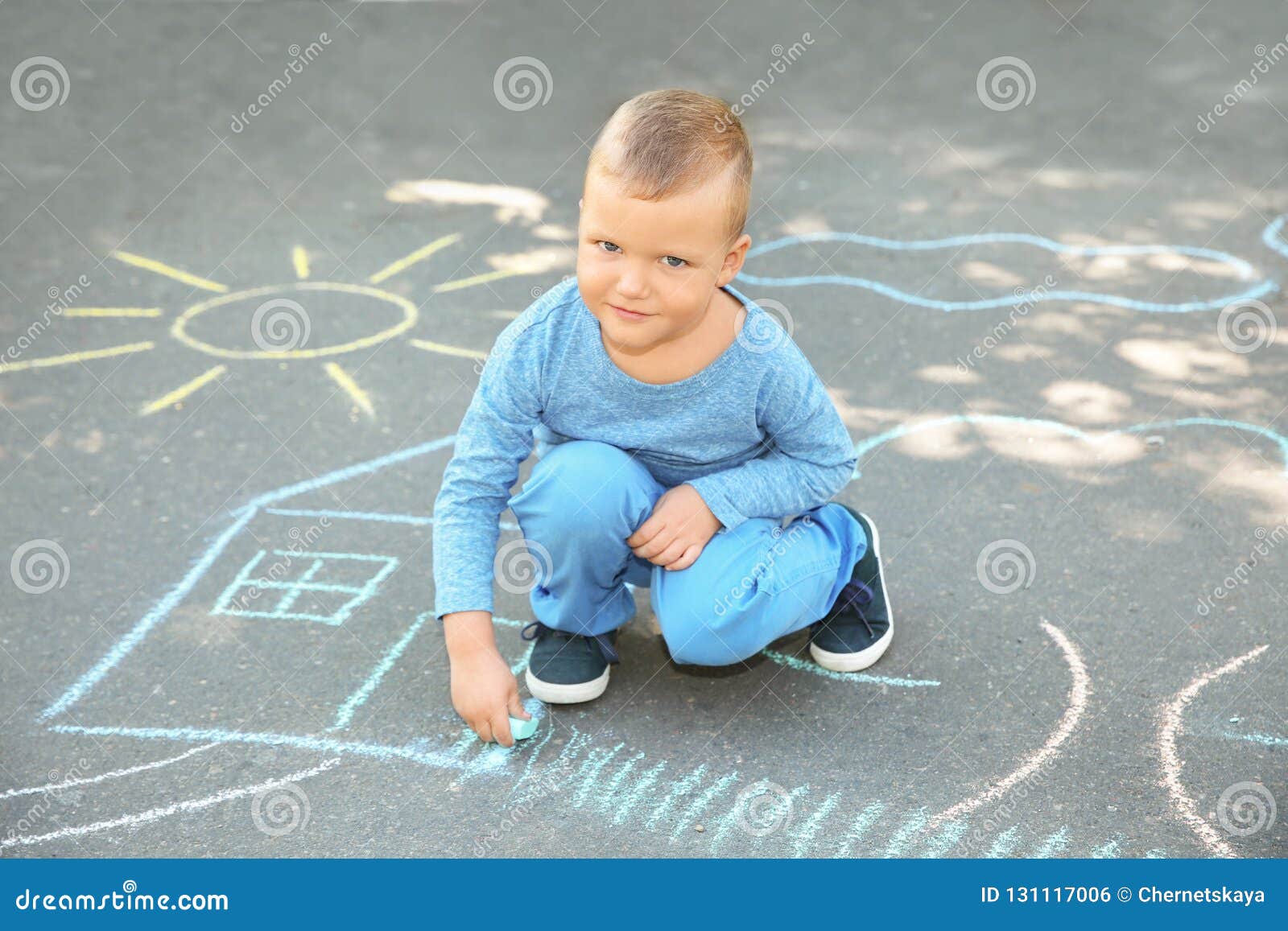 Little Child Drawing with Colorful Chalk Stock Photo - Image of ...