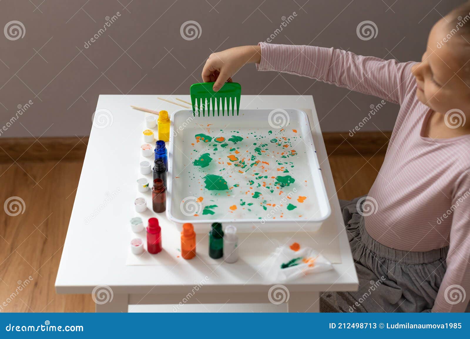 Little Child Drawing in Ebru Technique and Using Different Tools Stock ...