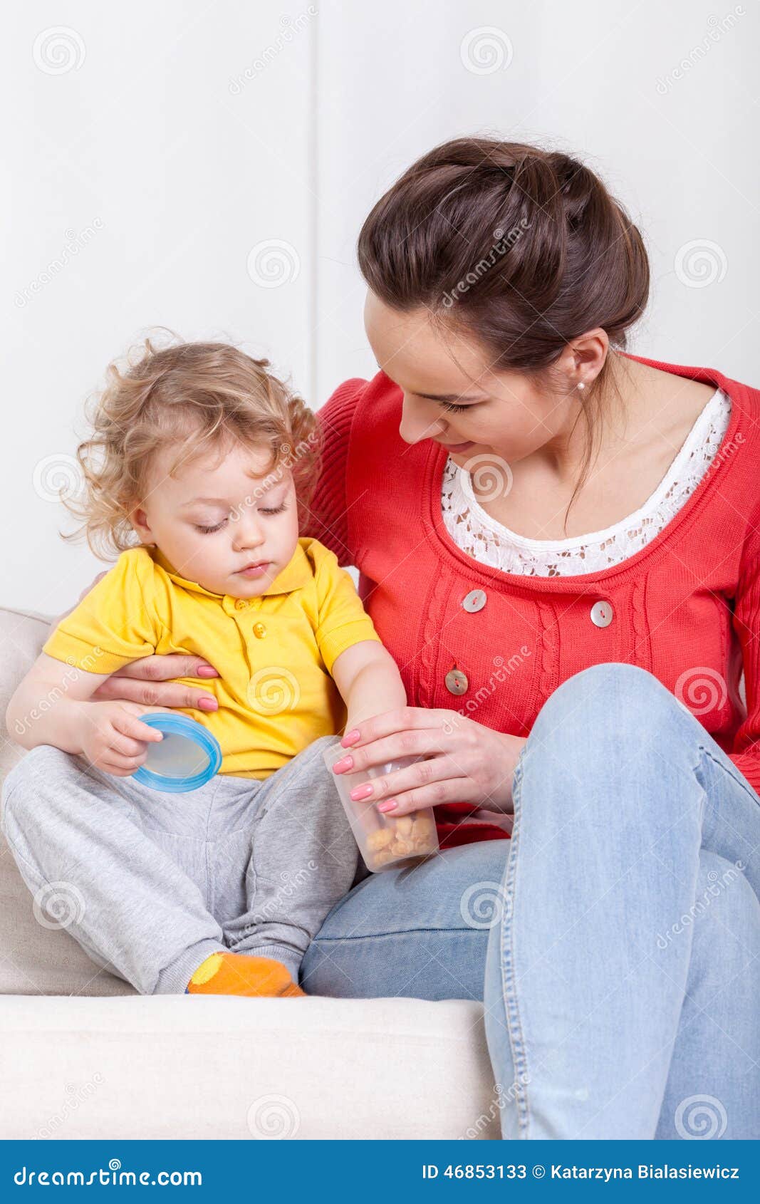 Little child eating snacks stock image. Image of child - 46853133