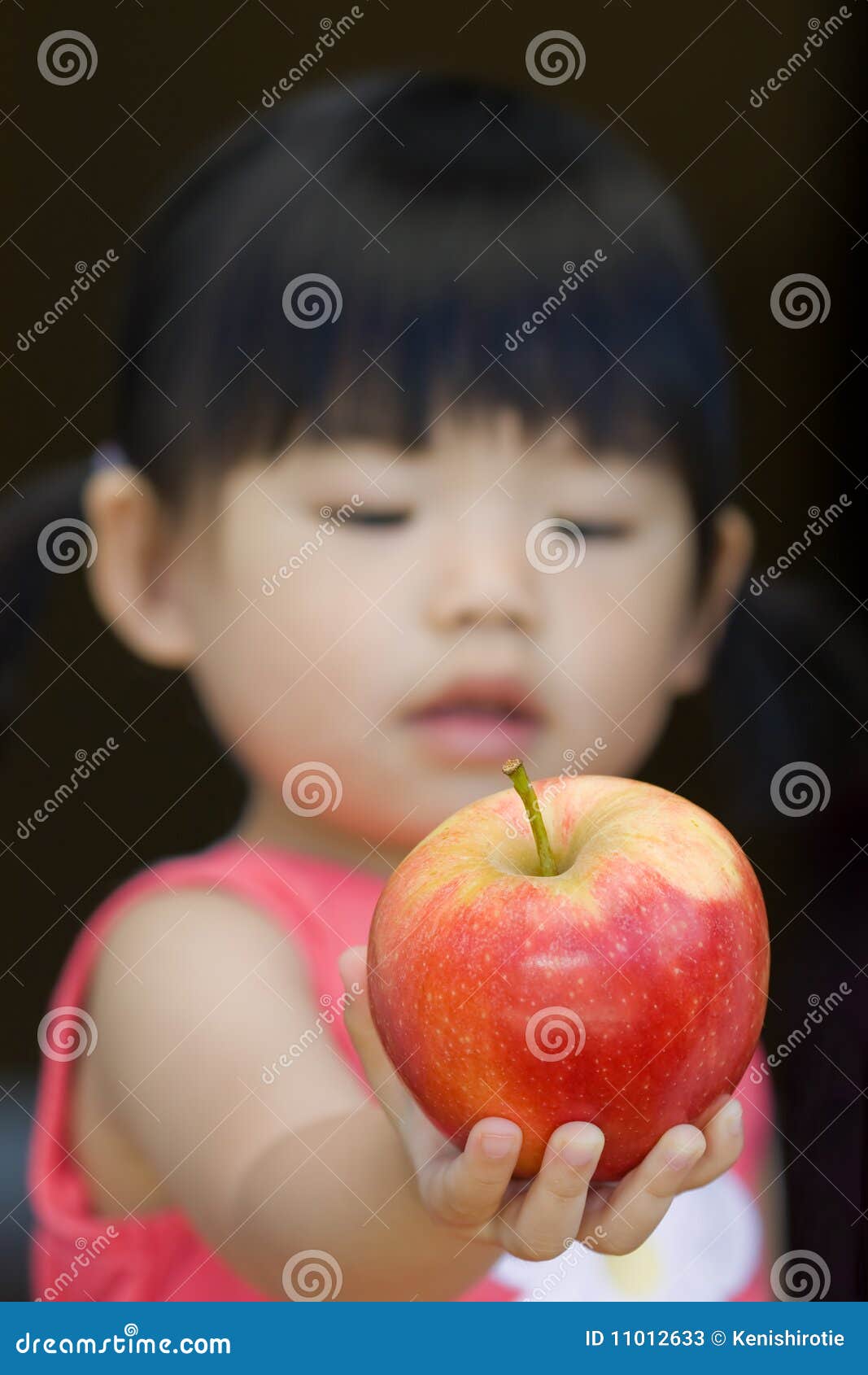 A Little Child Hold an Red Apple Stock Image - Image of little, youth ...