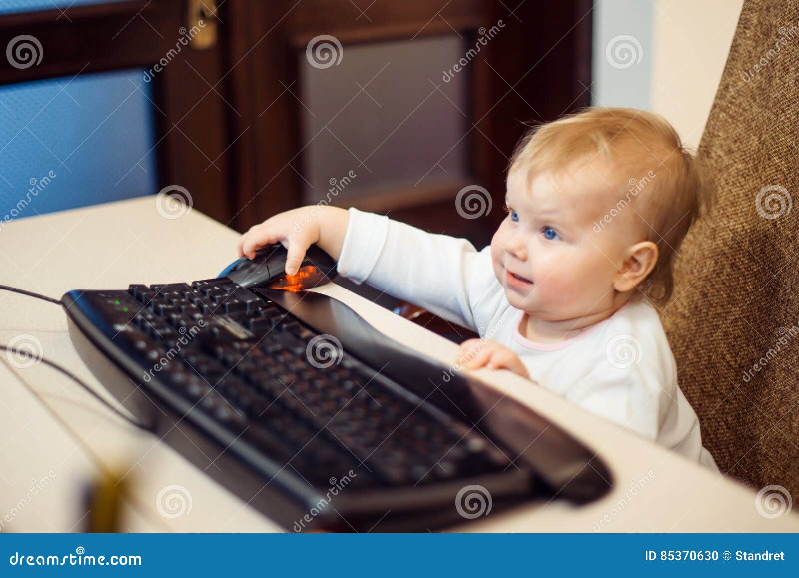 Little child with keyboard stock photo. Image of childhood - 85370630