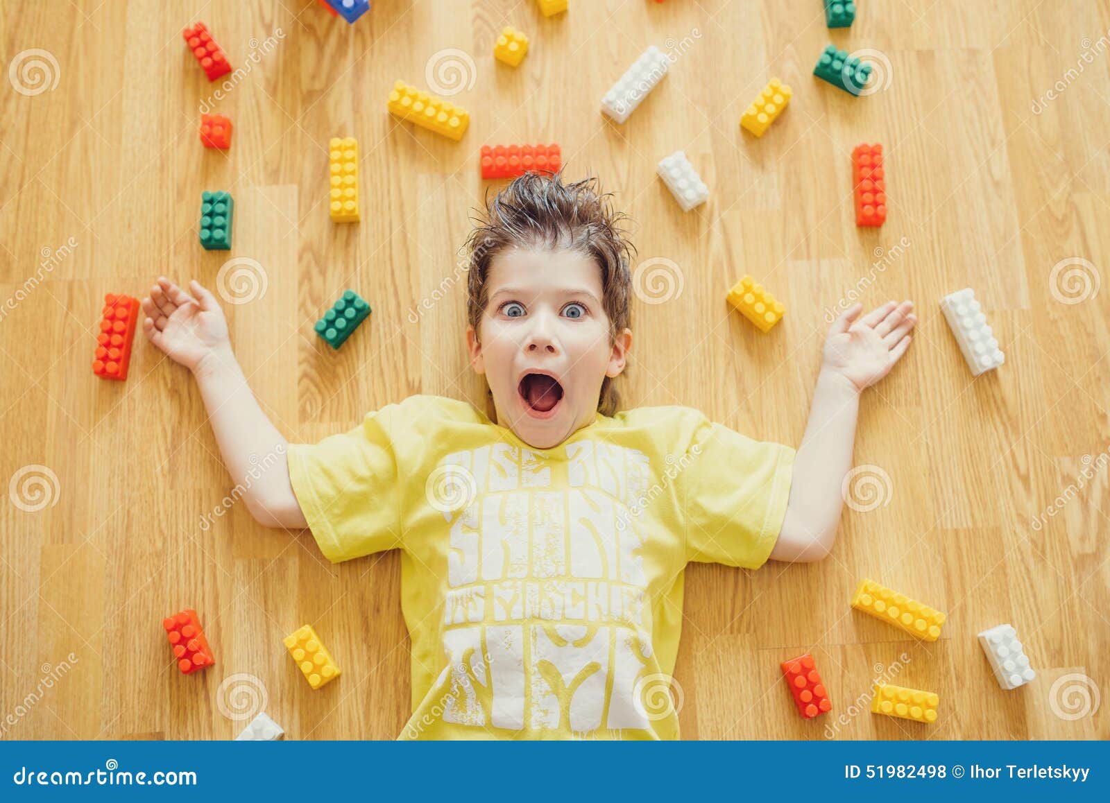 Little Child is Laying with Colorful Plastic Blocks Stock Photo - Image ...