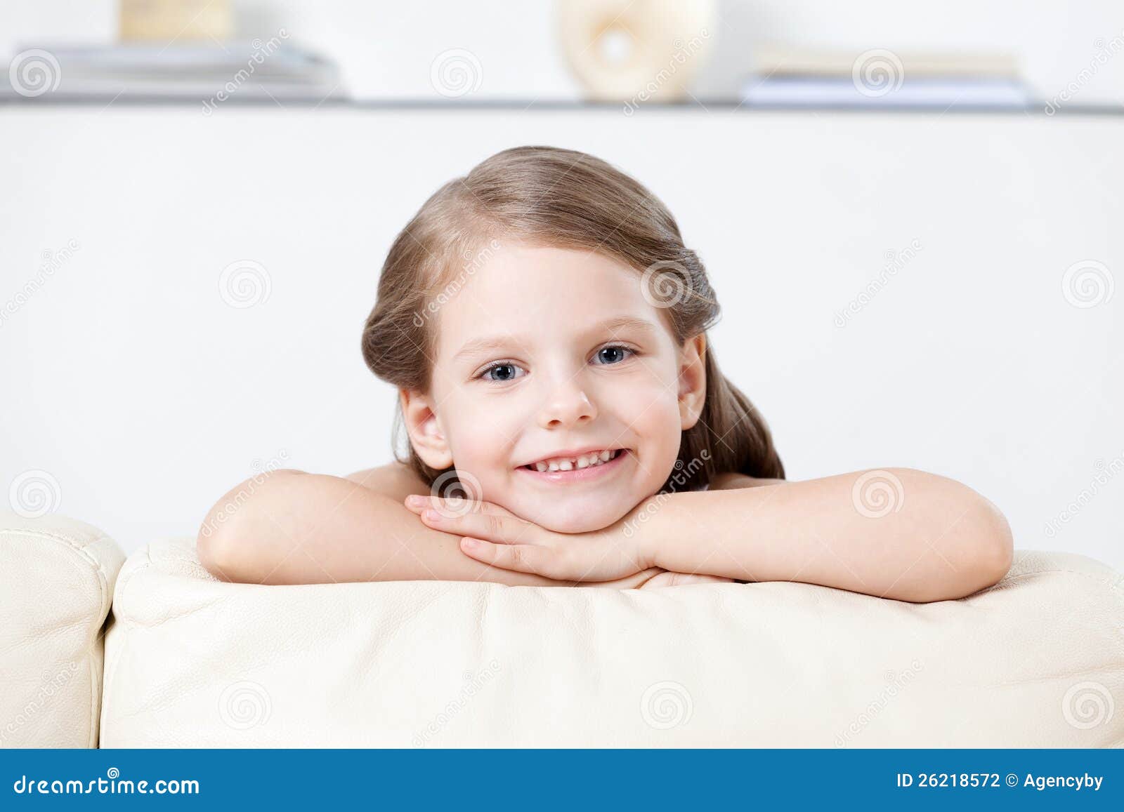 Little Child Leans To the White Leather Sofa Stock Photo - Image of ...
