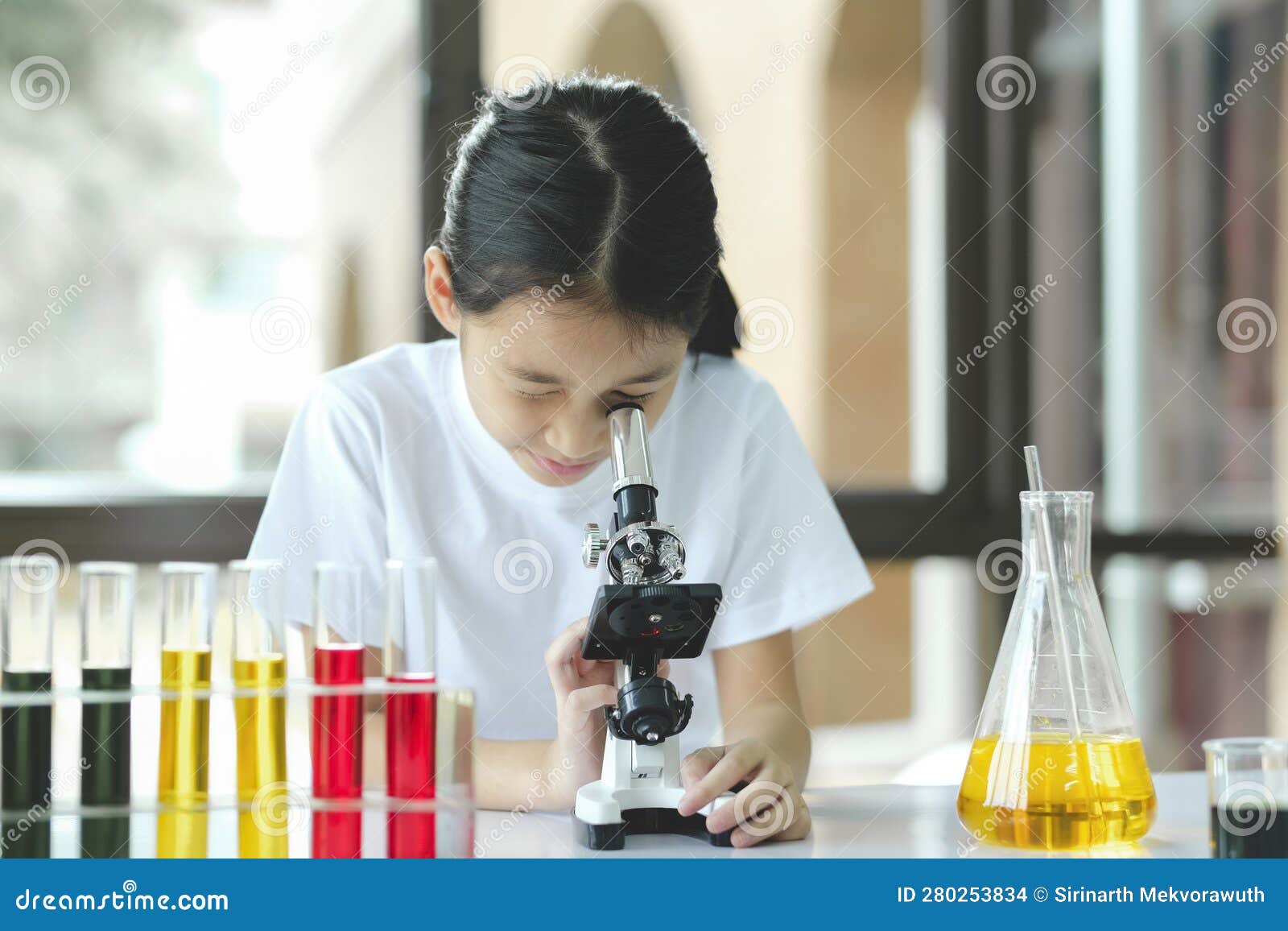 Little Child with Learning Class in School Laboratory Using Microscope ...