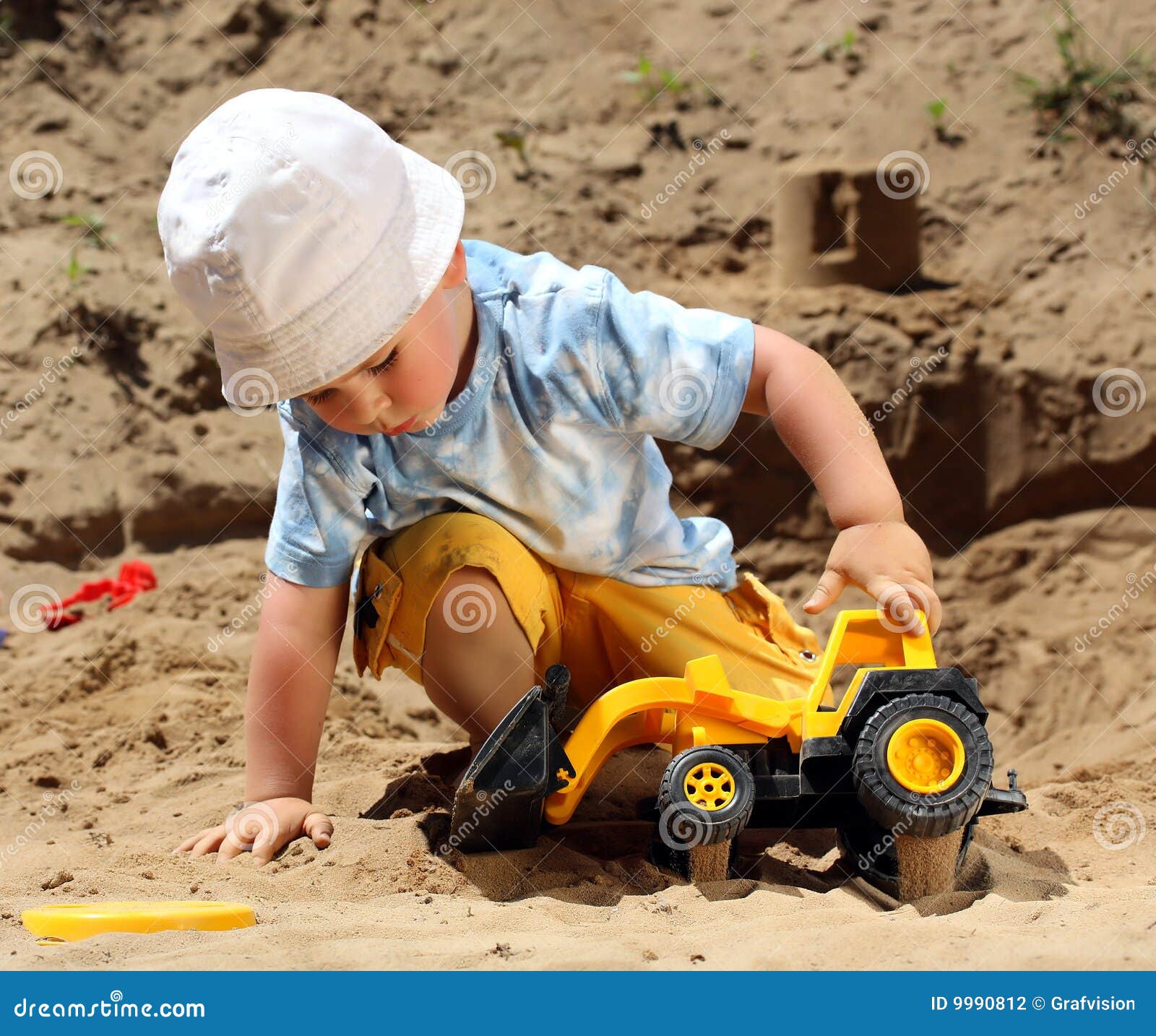 Little child play stock photo. Image of sunlight, bucket - 9990812