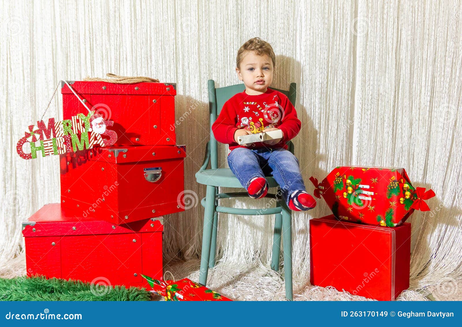 Little Child Playing with Christmas Decorations in Studio, Little Child ...