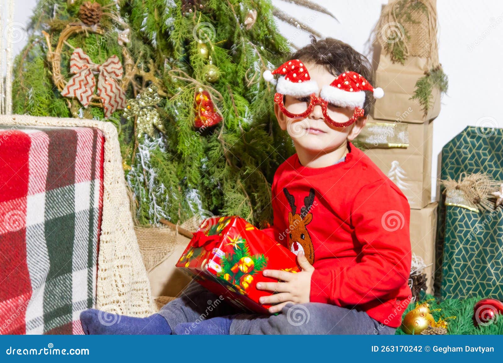 Little Child Playing with Christmas Decorations in Studio, Little Child ...