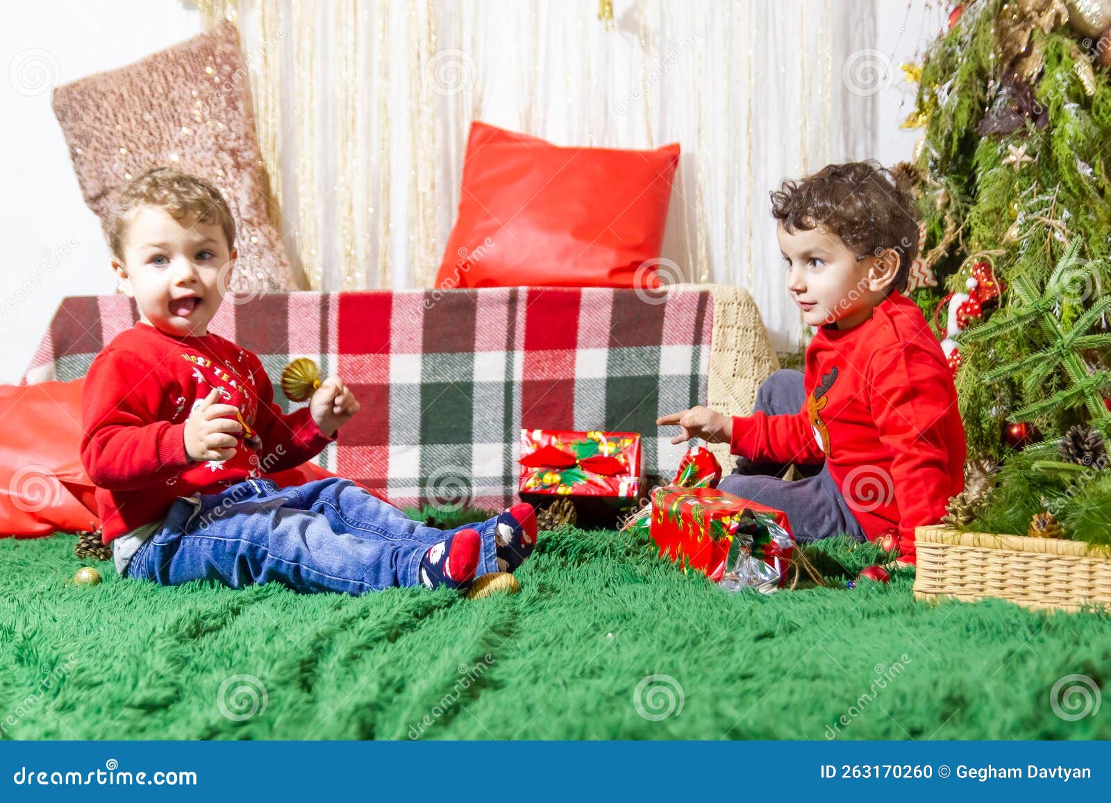 Little Child Playing with Christmas Decorations in Studio, Little Child ...