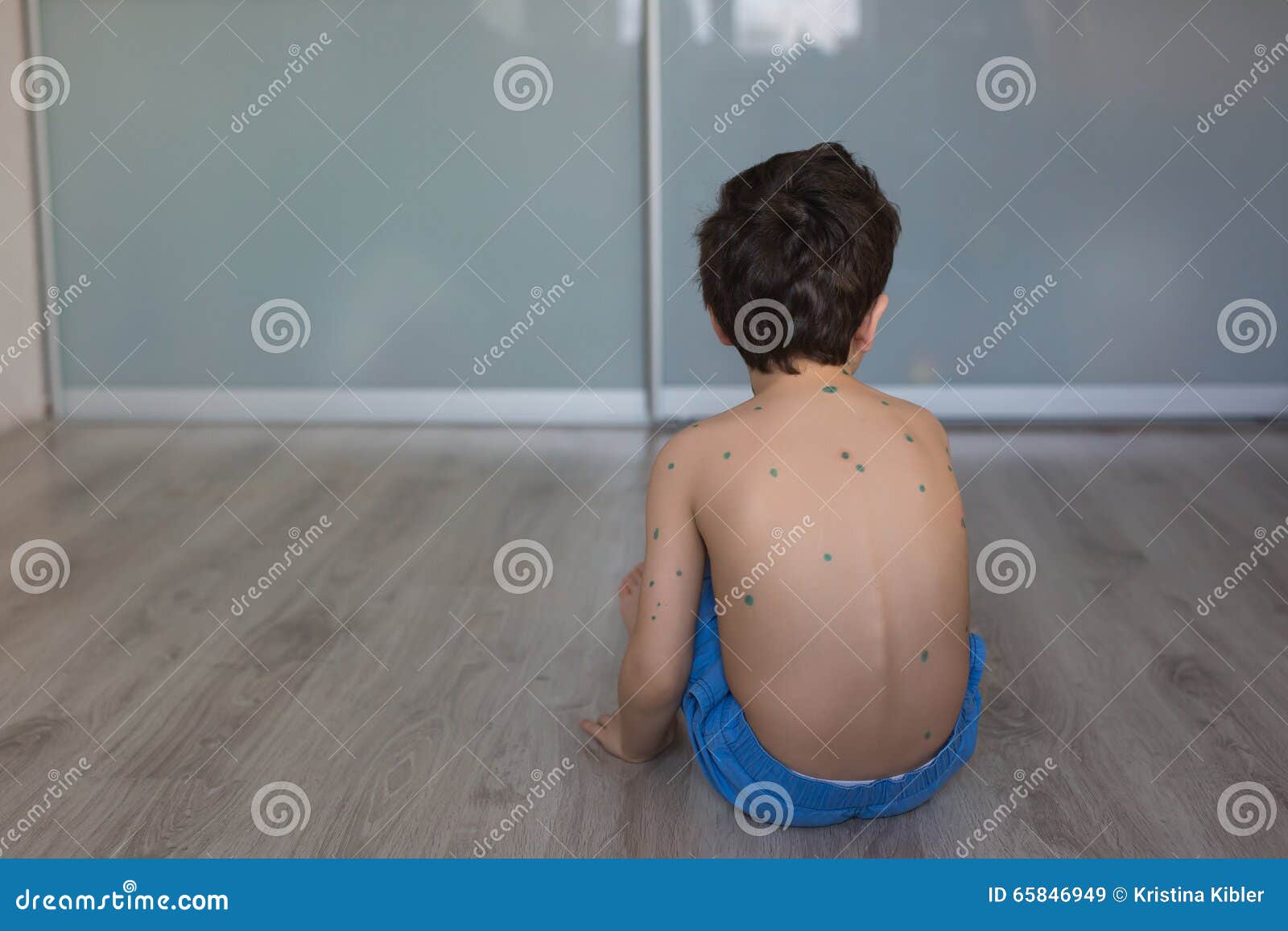 Little Child Sits Back on a Floor at Home Stock Image - Image of ...