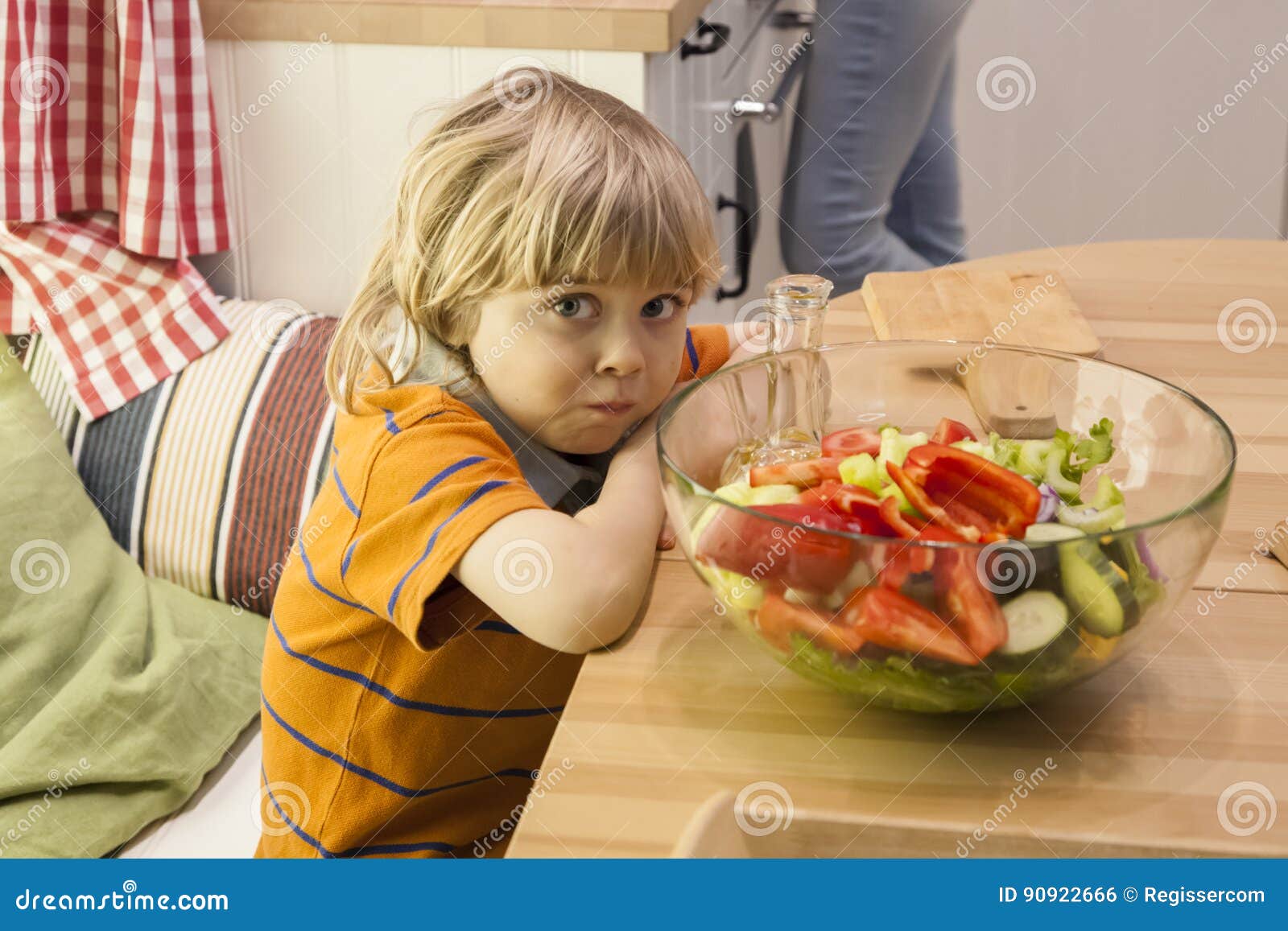Little Child is Sitting at the Table with Salad Stock Photo - Image of ...