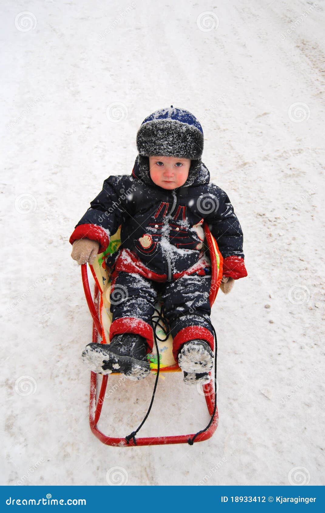 A little child on sled stock photo. Image of pink, chill - 18933412