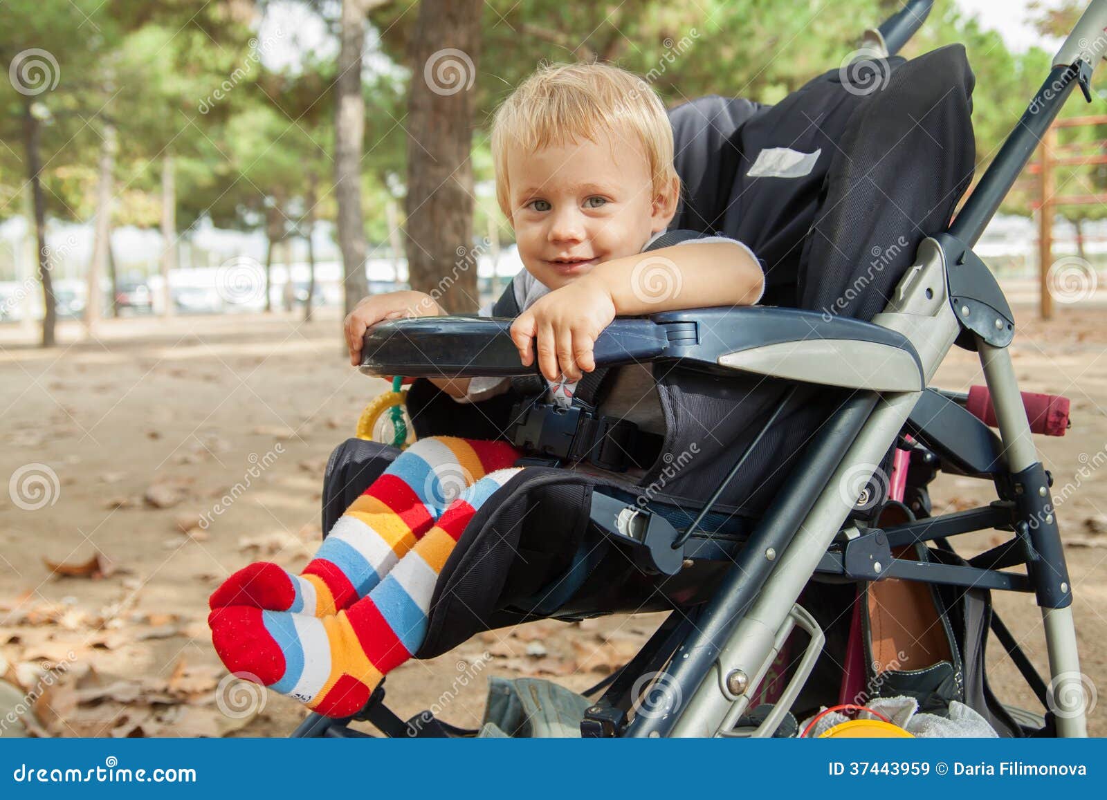 Little child in stroller stock image. Image of young - 37443959