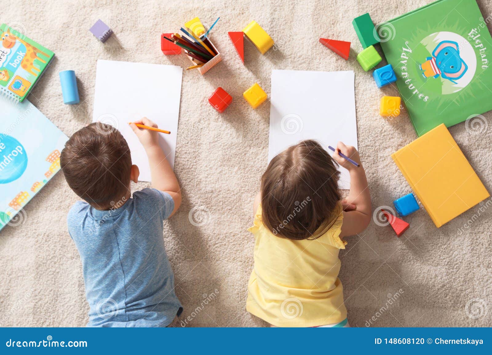 Little Children Drawing Indoors. Learning and Playing Stock Photo ...