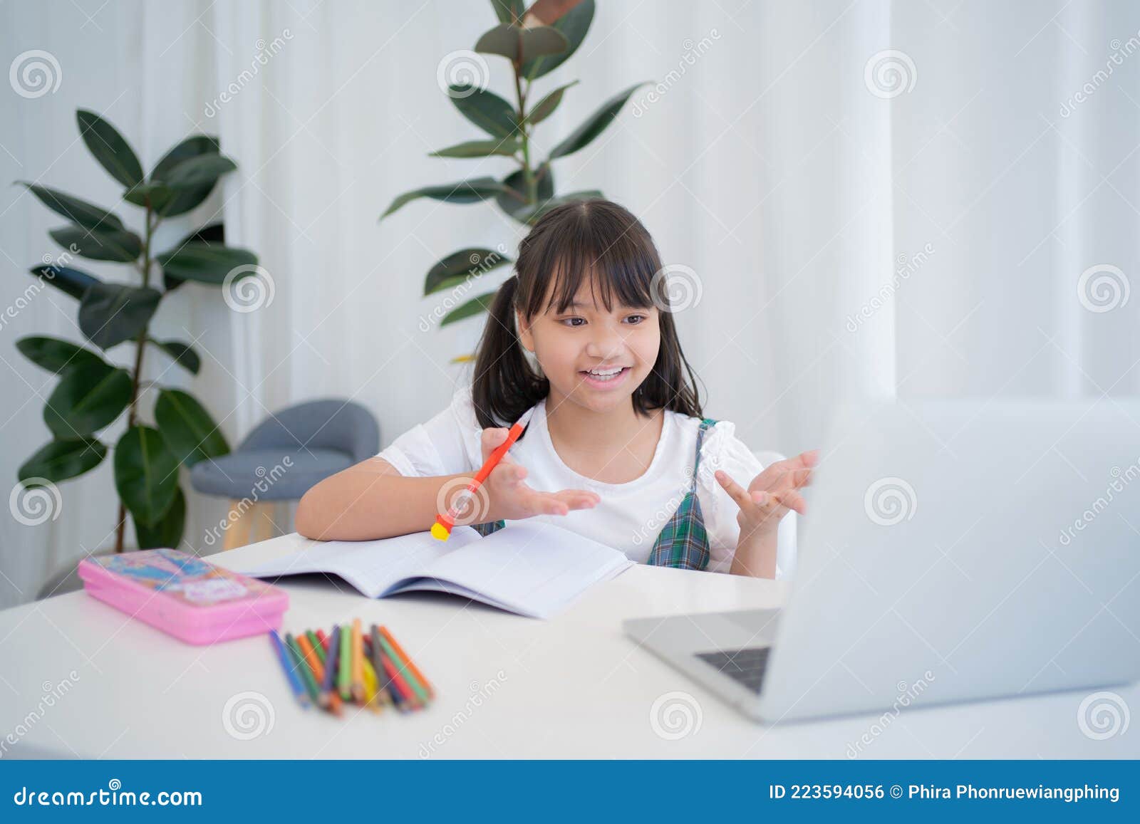 Little Children, Girls Study Online at Home. she is Explaining Stock ...
