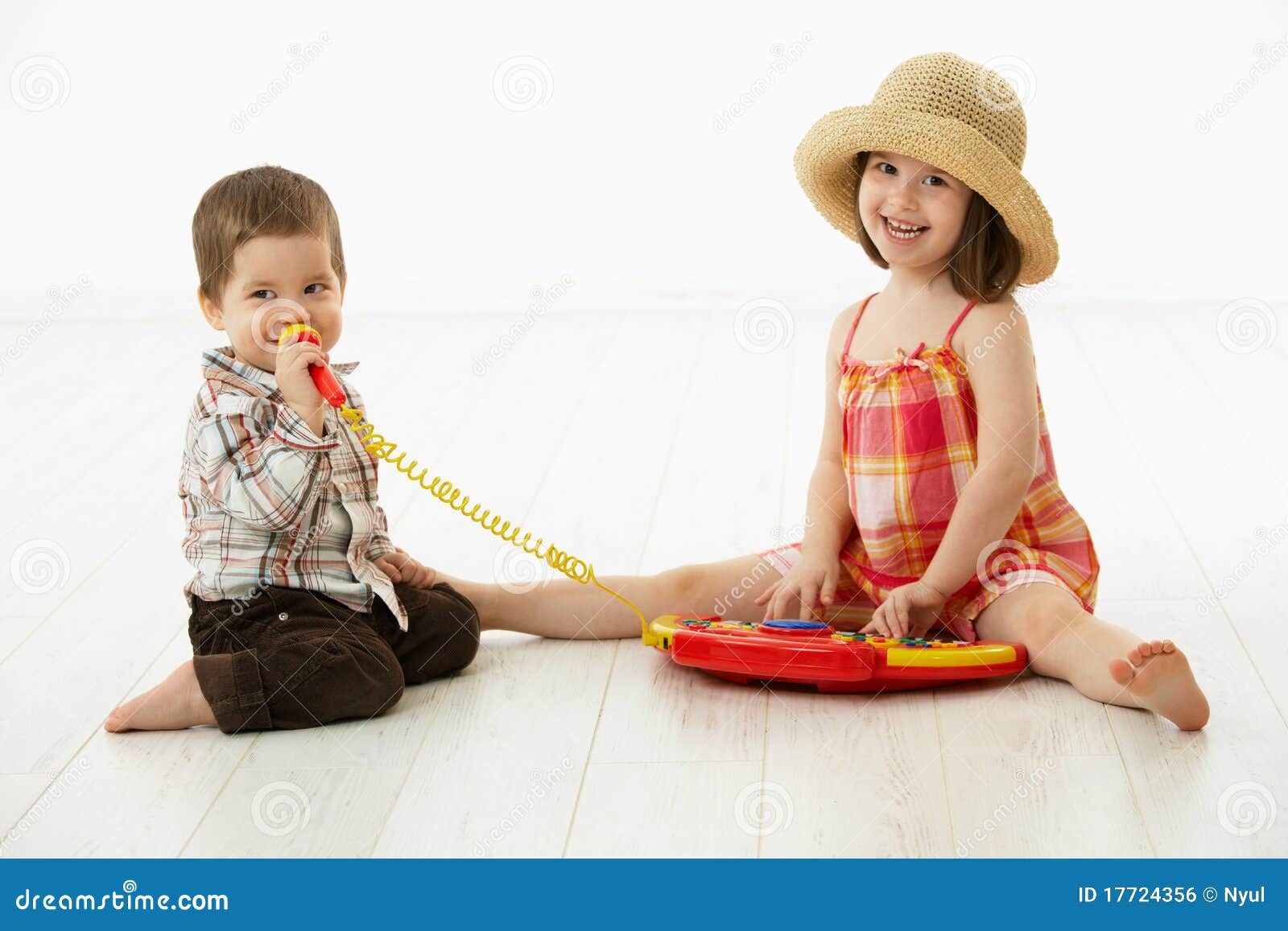 Little Kids Playing With Toys