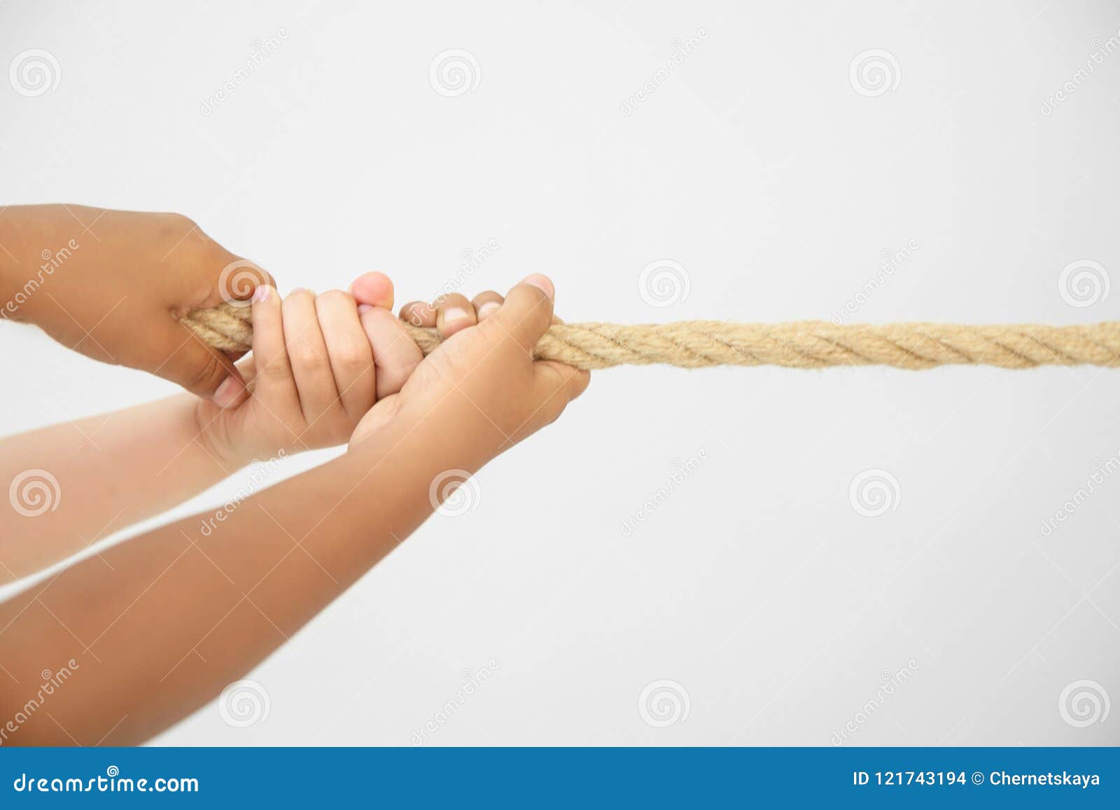 Little Children Pulling Rope on Light Background, Focus on Hands. Stock ...