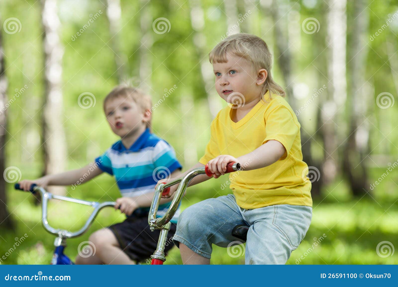 Little Children Riding Their Bikes Outdoors Stock Photo - Image of ...