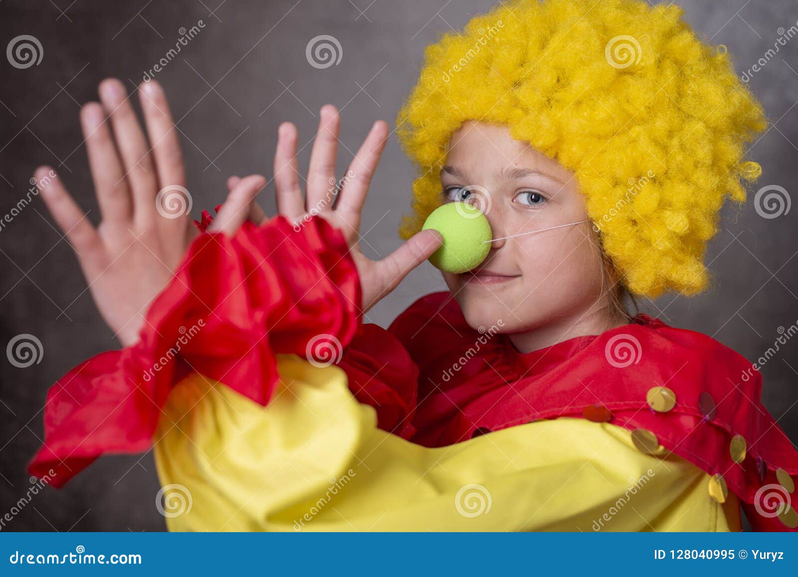 Little clown doing trick stock image. Image of hands - 128040995
