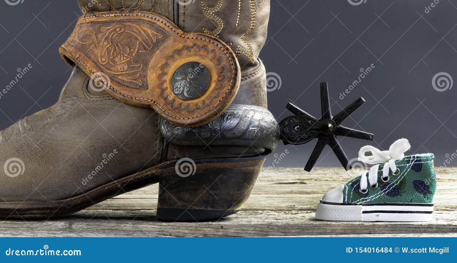 Little Cowboy and Big Cowboy Stock Photo - Image of player, roper ...