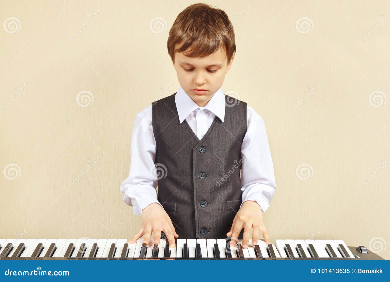 Little Cut Boy in Suit Playing the Electronic Synthesizer Stock Image ...