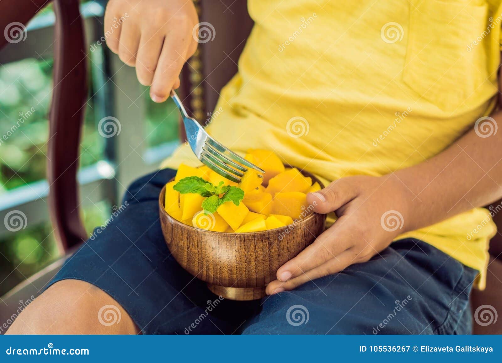 Little Cute Boy Eating Mango on the Terrace Stock Image - Image of ...