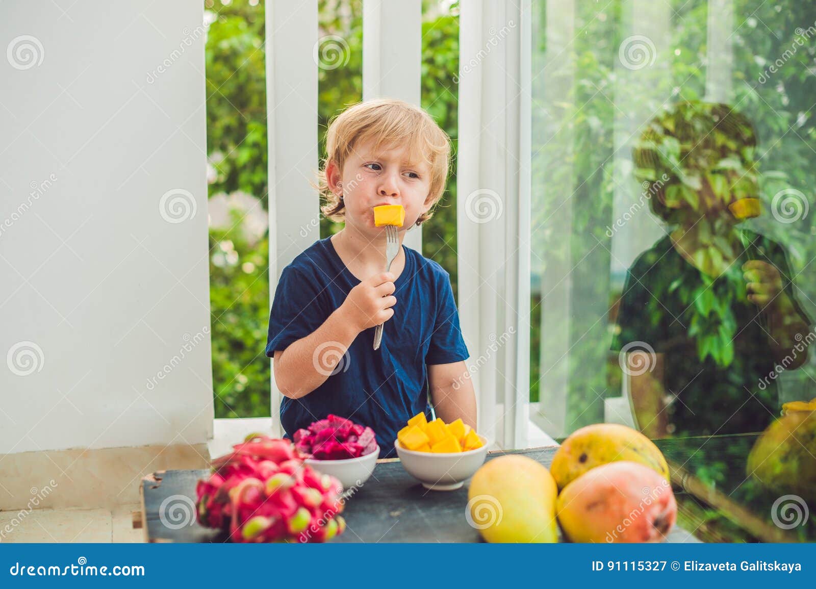 Cute Baby Eating Mango