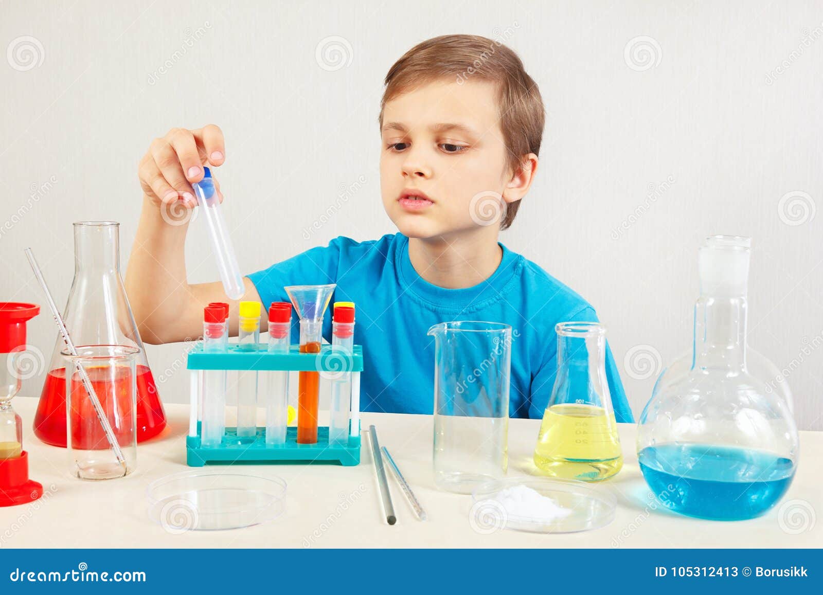 Little Cute Boy is Engaged in Chemical Experiments in Laboratory Stock ...