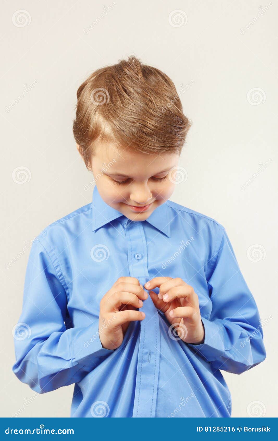 Little Cute Boy Fastened the Buttons on Bright Shirt Stock Photo ...