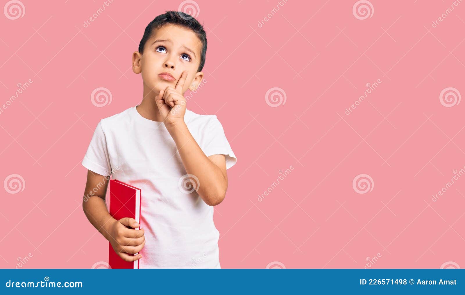 Little Cute Boy Kid Reading a Book Serious Face Thinking about Question ...