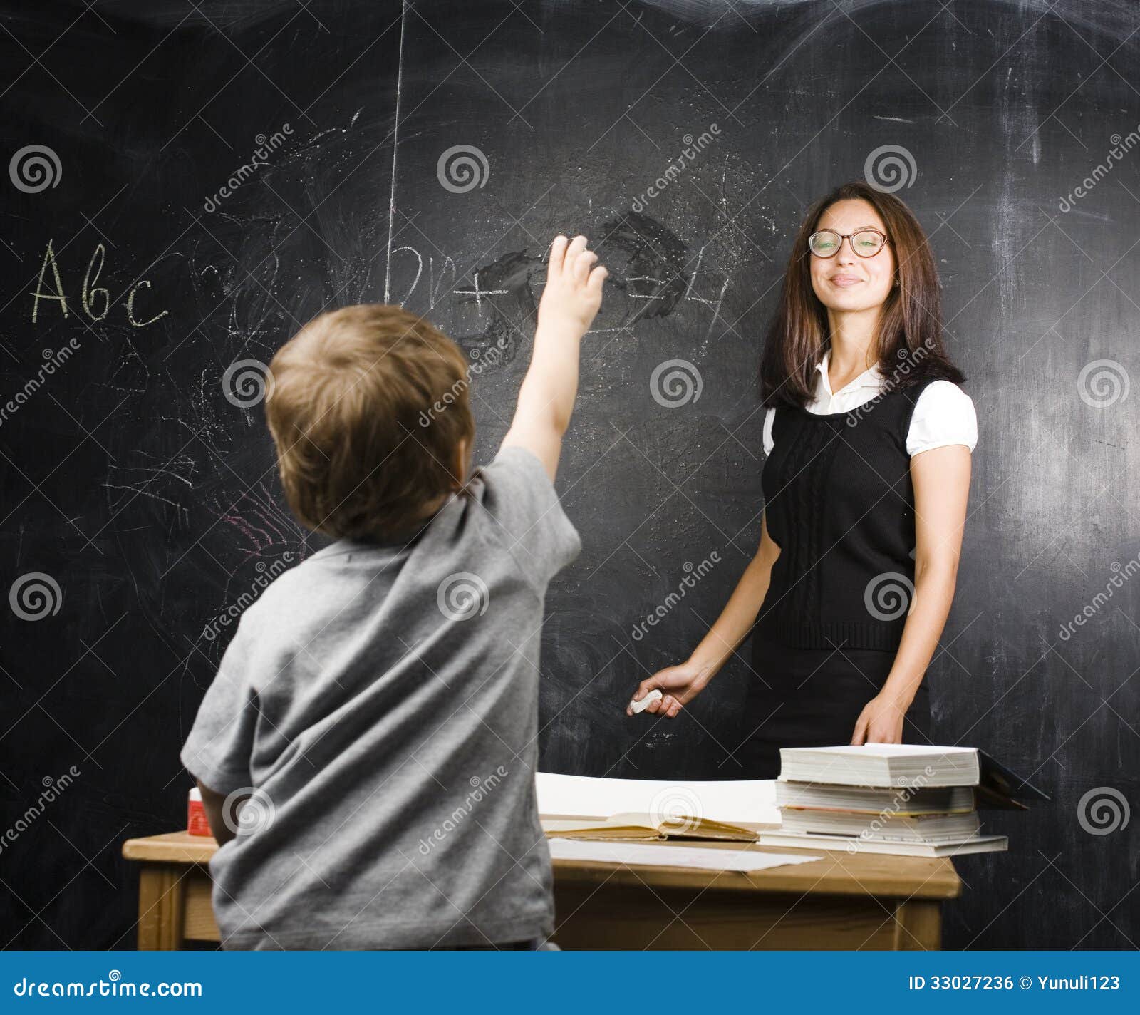 Little Cute Boy with Teacher in Classroom Stock Photo - Image of child ...