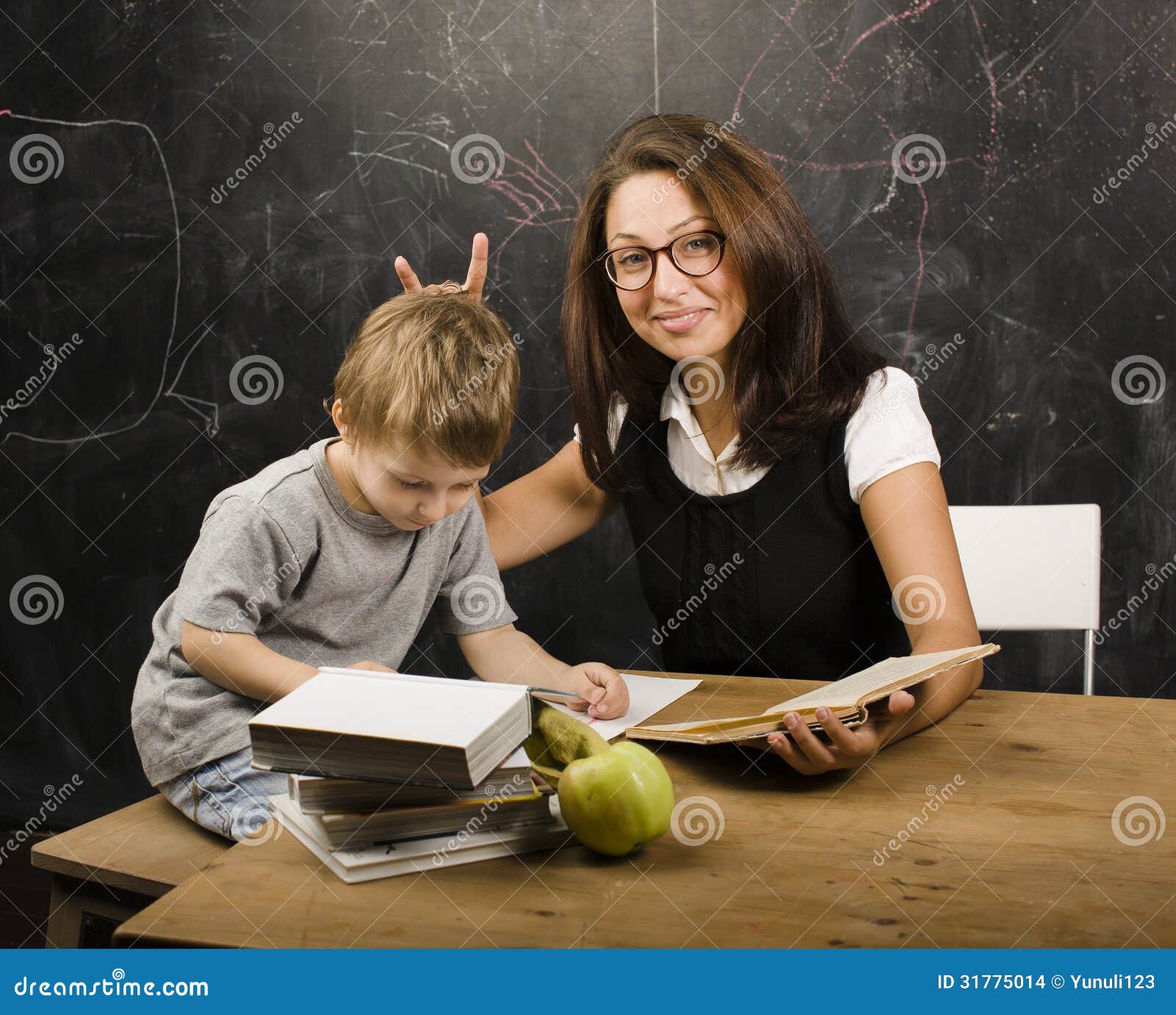 Little Cute Boy with Teacher in Classroom Stock Photo - Image of ...