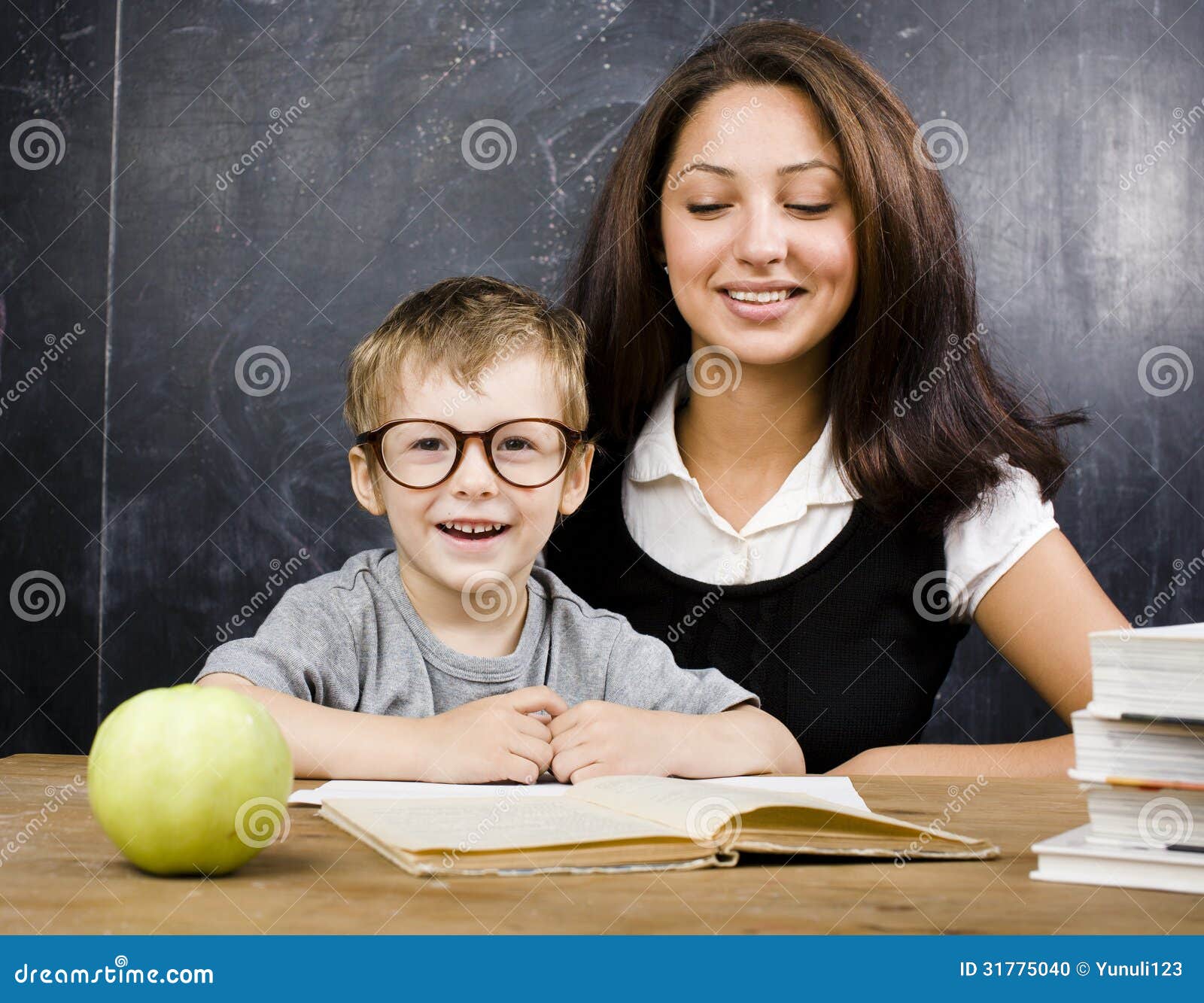 Little Cute Boy with Teacher in Classroom Stock Photo - Image of grader ...